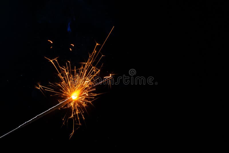 A Lit Sparkler Showing Bright Sparks Desing Abstract Stock Photo ...