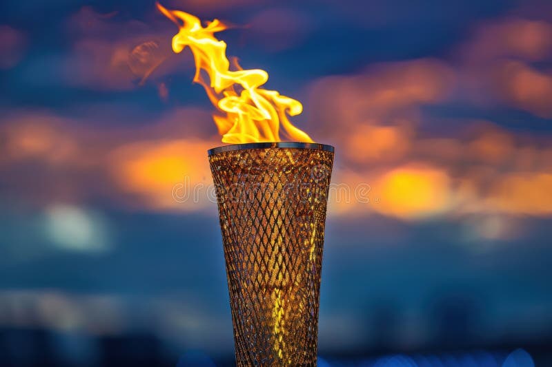 A Lit Torch is in the Foreground of a Sunset Stock Image - Image of ...