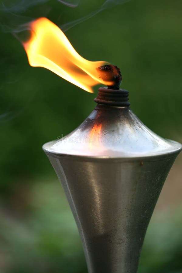Lit Torch with Orange Flame Stock Image - Image of summer, flame: 9971737