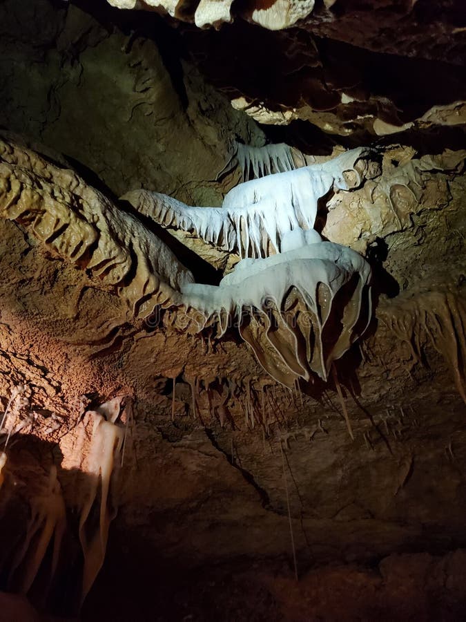Lit up cave formations stock image. Image of underground - 149984251