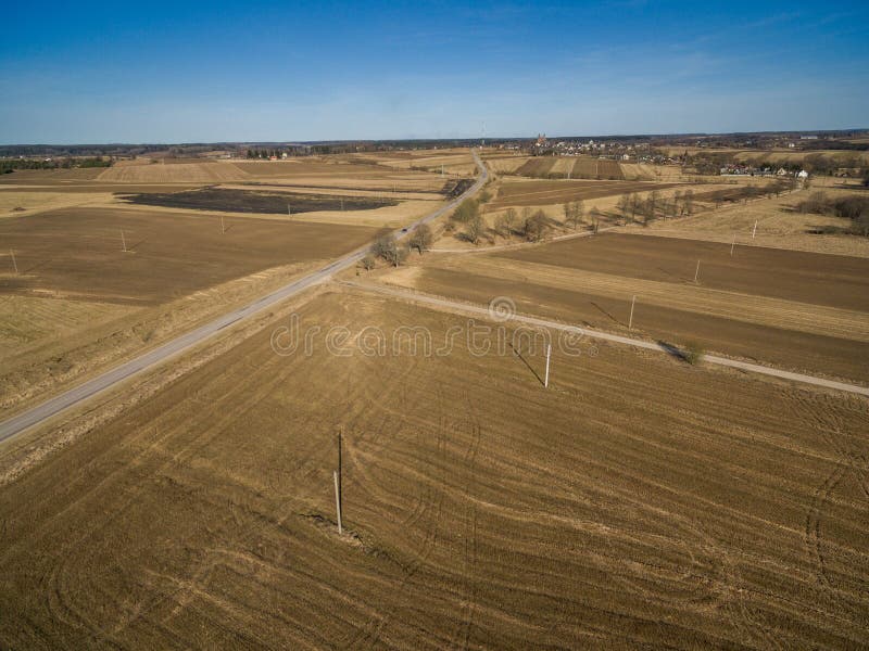Lithuania Spring Landscape with Road and Harvest Fields with Blue Sky ...