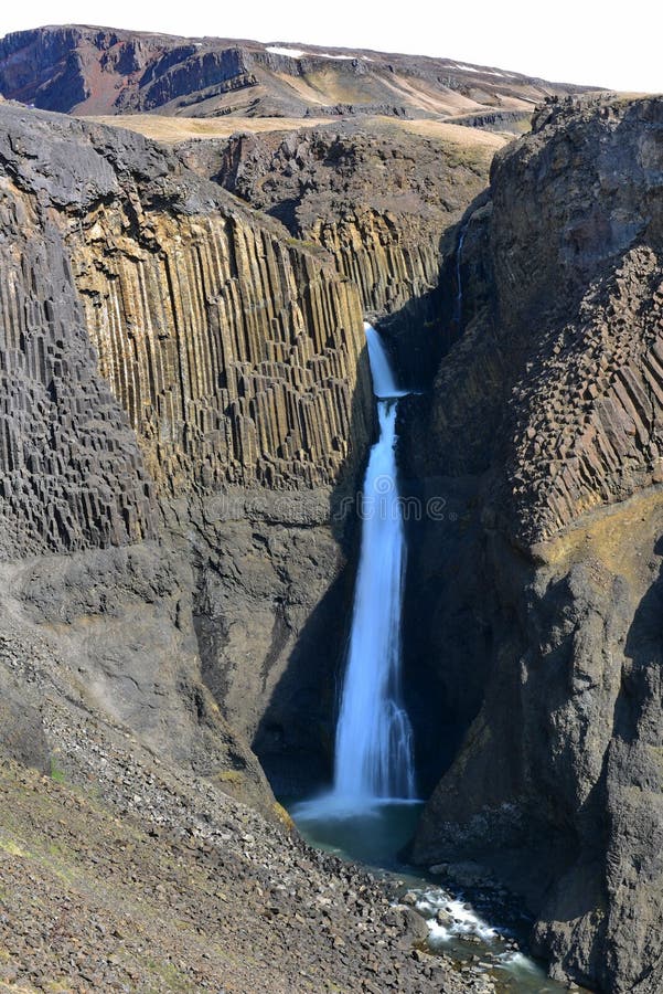 Litlanesfoss Waterfall in East Iceland Near Hengifoss Waterfall. Stock ...