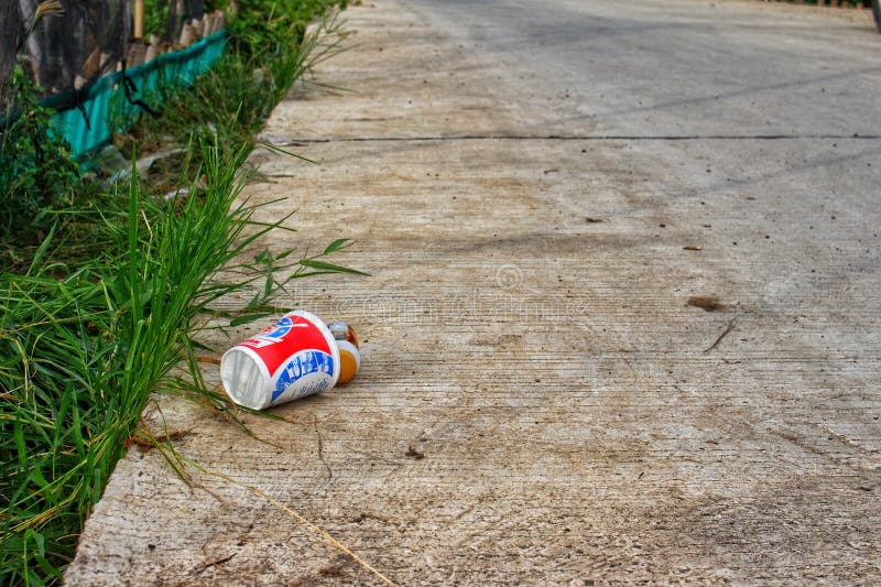 Littered Cup and Bottle on Roadside Stock Image - Image of concrete ...