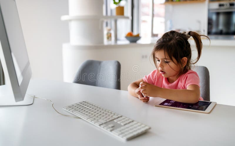 Little Addicted Child Playing with Technology Devices at Home Stock ...