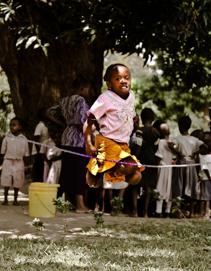 A Little African Girl Jumping Rope Editorial Image - Image of eyes ...
