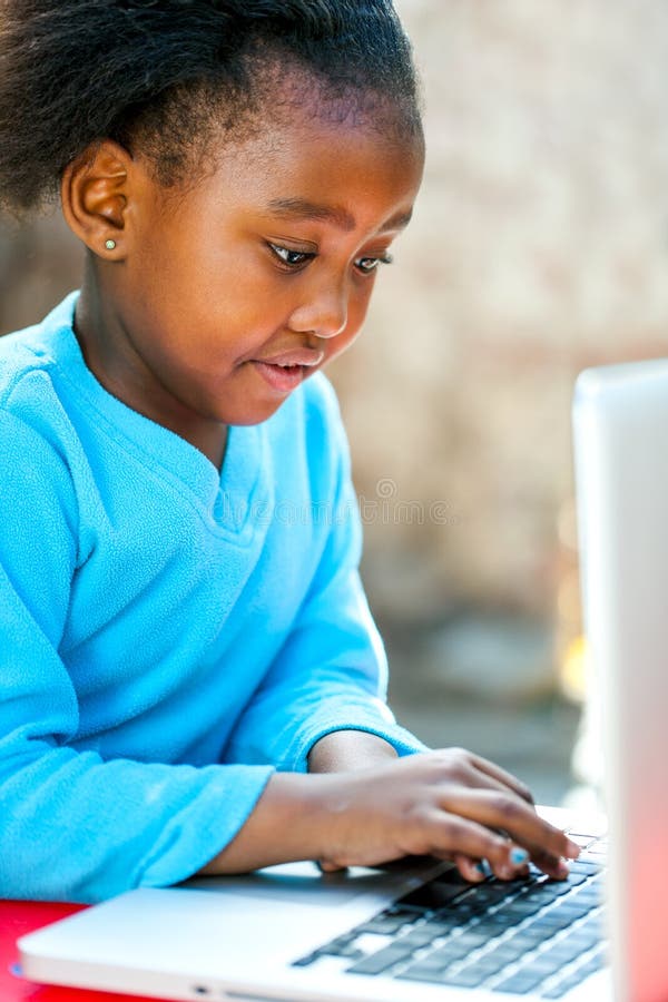 Little African Girl Typing on Laptop. Stock Photo - Image of afro ...