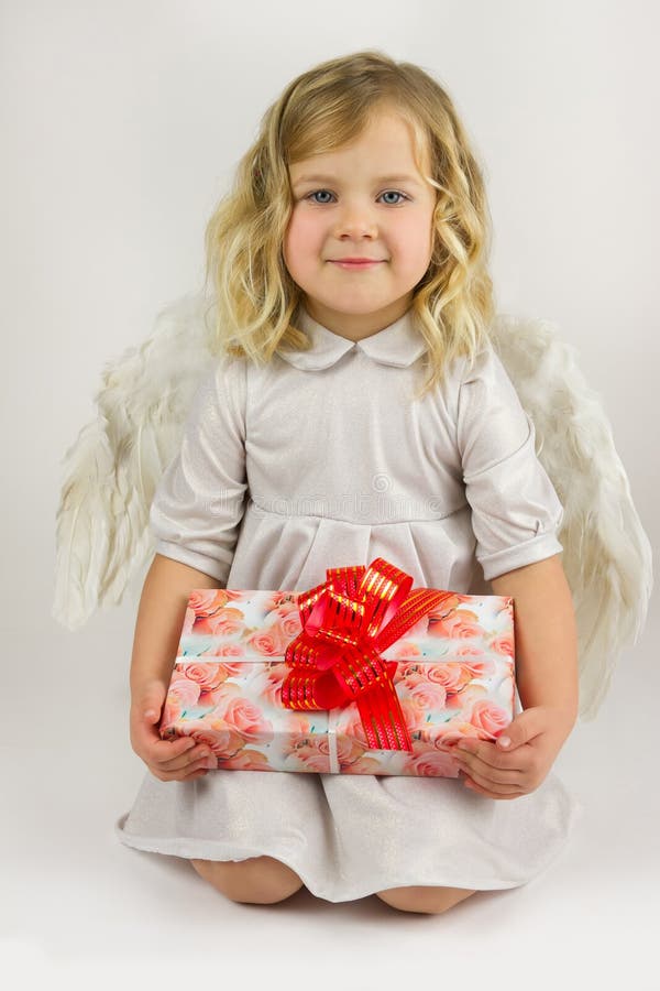 Little angel stock image. Image of smile, hands, holding - 36710687