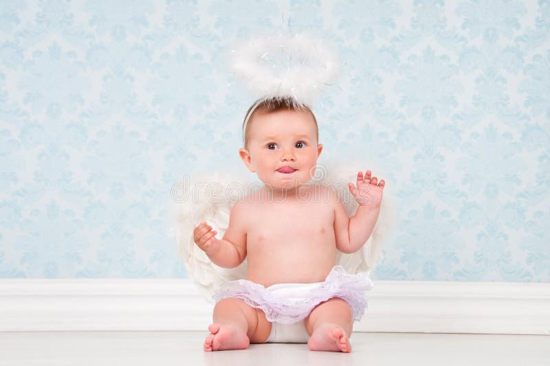 Little Angel Smiling and Sitting on the Floor. Stock Photo - Image of ...