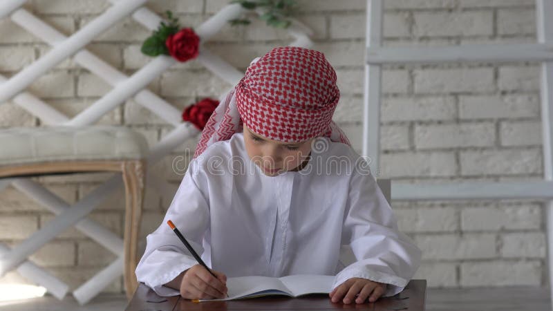 Little Arabic Boy Studying at School. Stock Image - Image of muslim ...