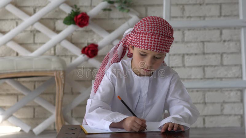 Little Arabic Boy Studying at School. Stock Photo - Image of education ...