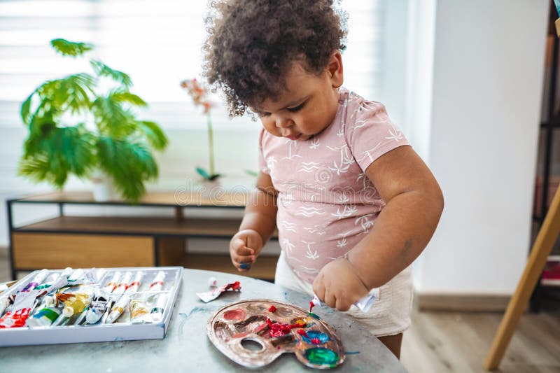 Little Artist Exploring Colors in a Bright Creative Space Stock Photo ...