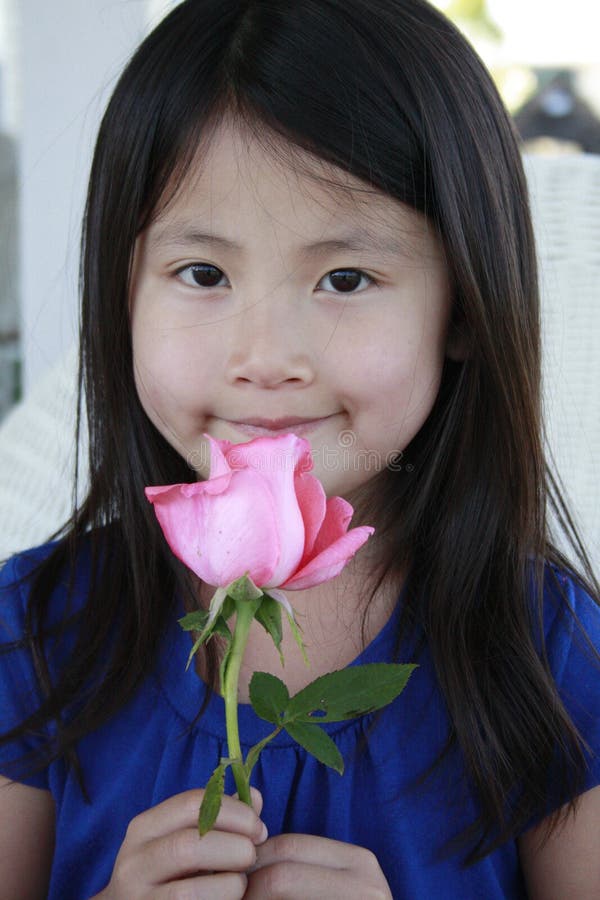 27+ Beautiful little girl holding rose Free Stock Photos - StockFreeImages