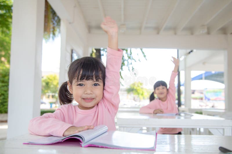 Little Asian Girl at Lesson in the Classroom Stock Image - Image of ...