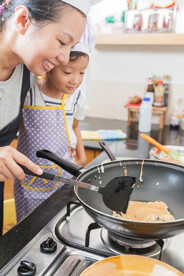 Little Asian Girl and Mother Making Pancake Stock Image - Image of cake ...