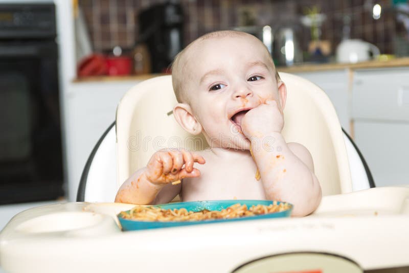 Little B Eating Her Dinner and Making a Mess Stock Photo - Image of ...