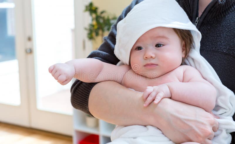 Baby boy with his parents stock photo. Image of little - 130879064