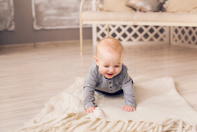 Little Baby Boy Crawling on the Floor at Home Stock Image - Image of ...