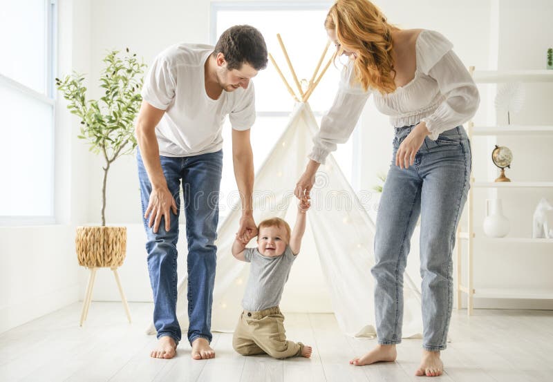 Little Baby Boy First Steps with the Help of Parent Stock Image - Image ...