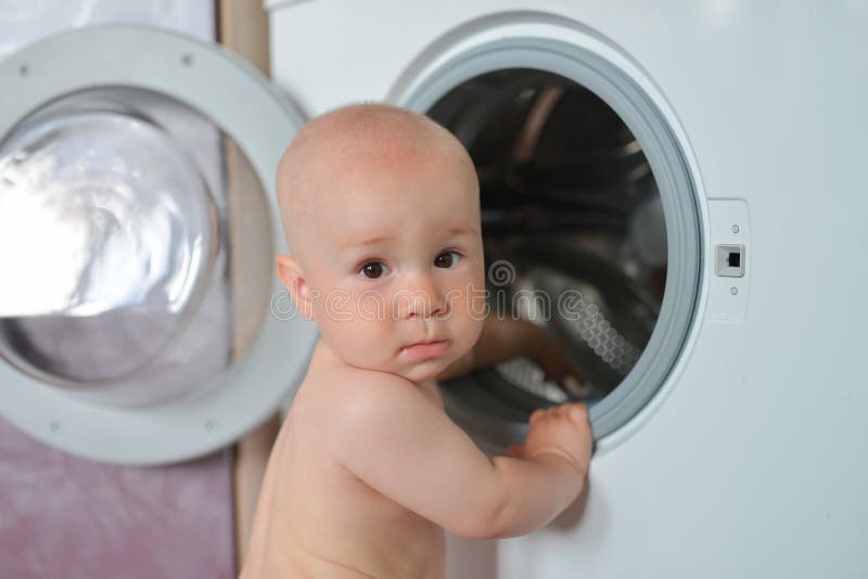 Little Baby Boy Playing with Washing Machine Stock Image - Image of ...