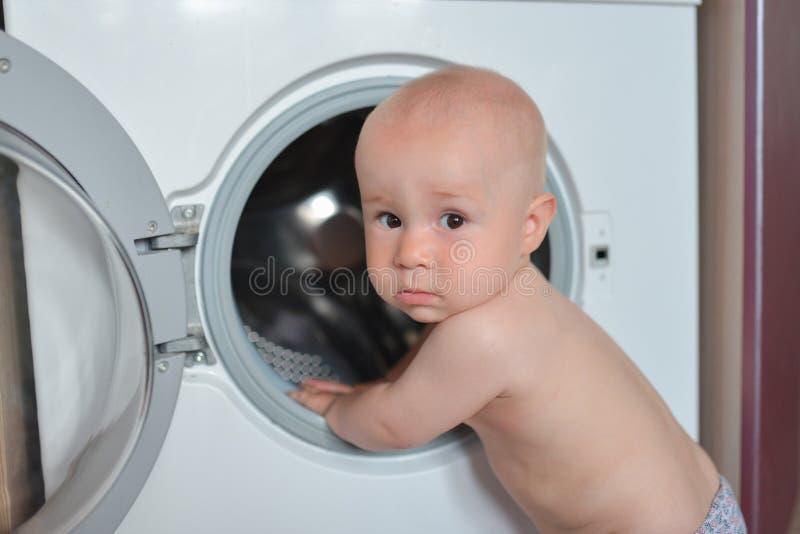 Little Baby Boy Playing with Washing Machine Stock Photo - Image of ...