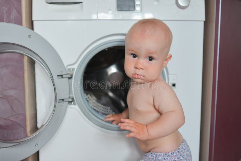 Little Baby Boy Playing with Washing Machine Stock Image - Image of ...