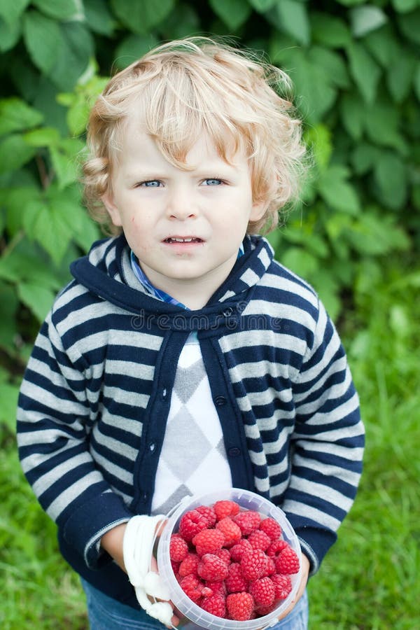 Little Baby Boy with Raspberry Bucket in Hands Stock Photo - Image of ...