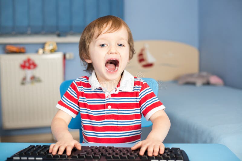 Little Baby Boy Screaming when Typing on Keyboard Stock Image - Image ...
