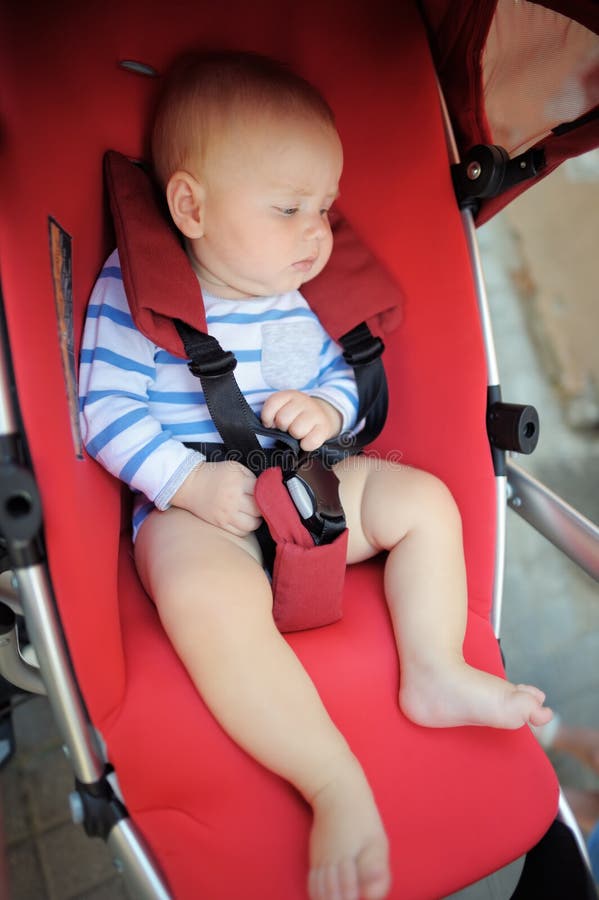 Little Baby Boy in a Stroller Stock Photo - Image of sitting, pram ...