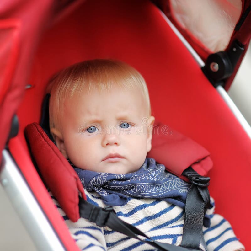 Little Baby Boy Sitting in the Stroller on Summer Day Stock Photo ...