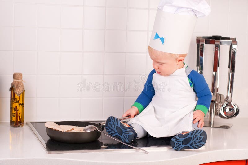 Little Baby Chef in the Cook Hat with Metal Ladle Stock Photo - Image ...