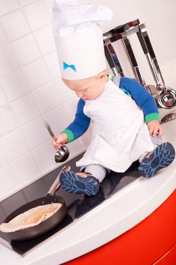 Little Baby Chef in the Cook Hat with Metal Ladle Stock Photo - Image ...