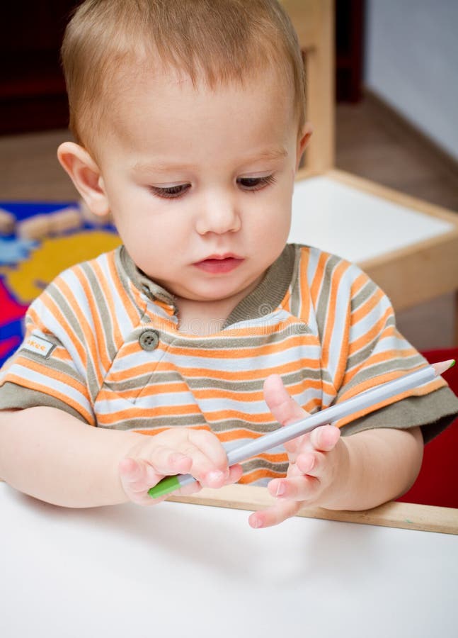 Little baby drawing stock image. Image of holding, smart - 20562641