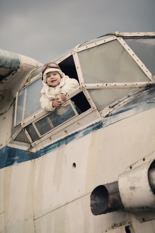 Little Baby Dreaming of Being Pilot Stock Image - Image of blue ...