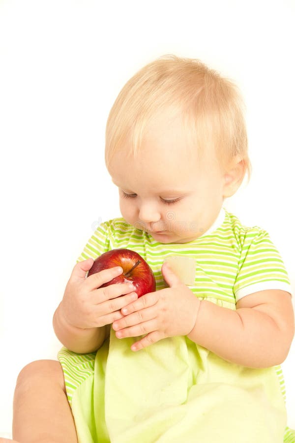 Little baby eat red apple stock photo. Image of juicy - 16964652