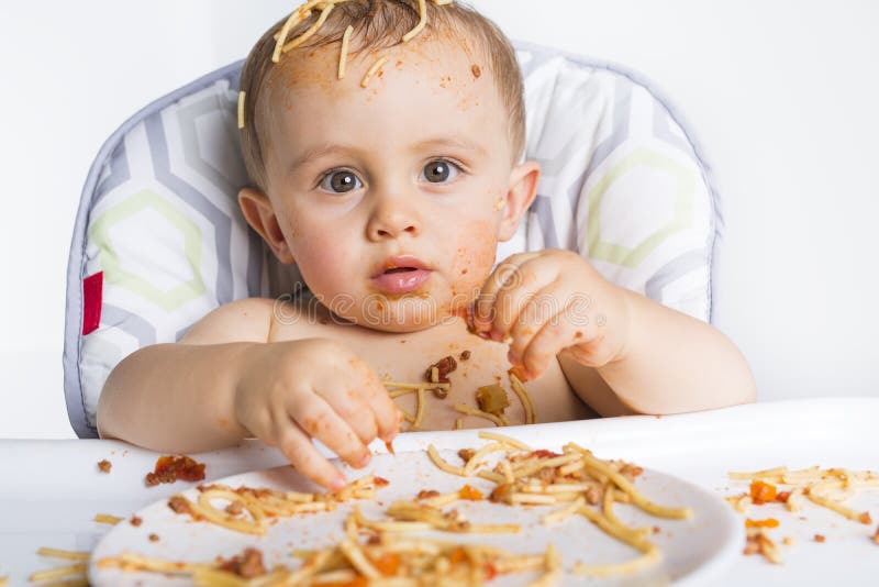 Little Baby Eating Her Dinner and Making a Mess Stock Image - Image of ...