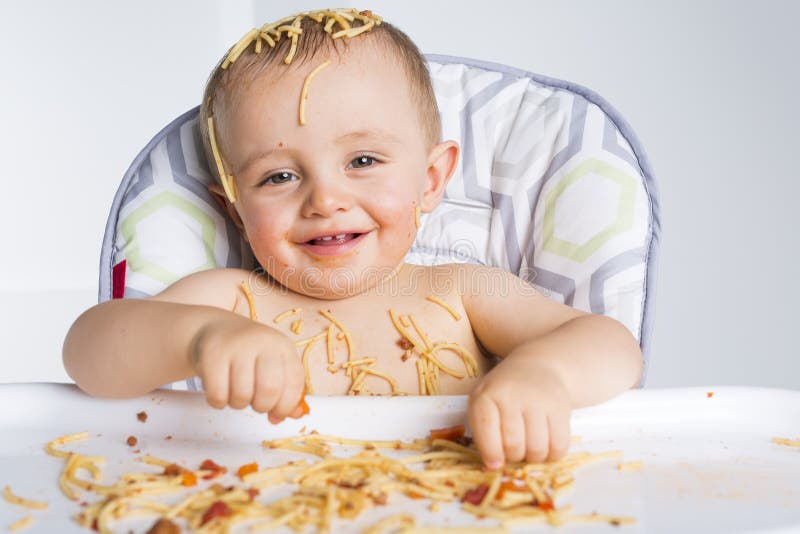 Little Baby Eating Her Dinner and Making a Mess Stock Image - Image of ...