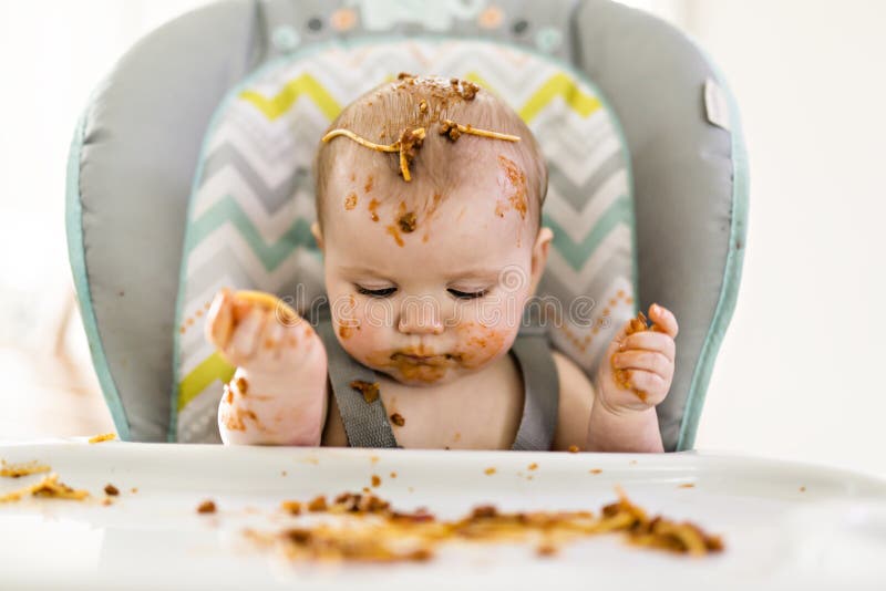 Little Baby Eating Her Dinner and Making a Mess Stock Image - Image of ...