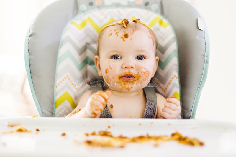 Little Baby Eating Her Dinner and Making a Mess Stock Image - Image of ...