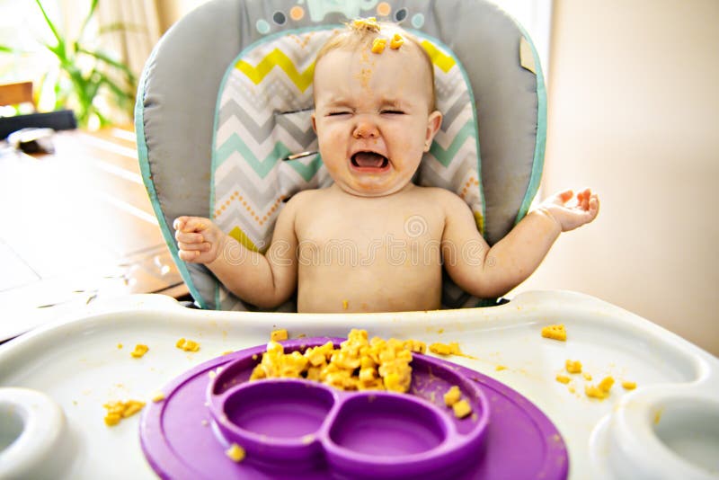 Little Baby Eating Her Dinner and Making a Mess Stock Photo - Image of ...