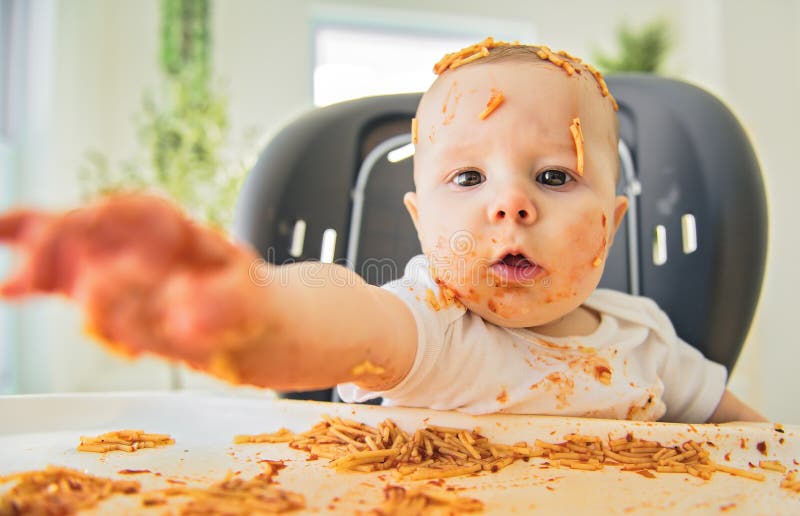 Little Baby Eating Her Dinner and Making a Mess Stock Image - Image of ...
