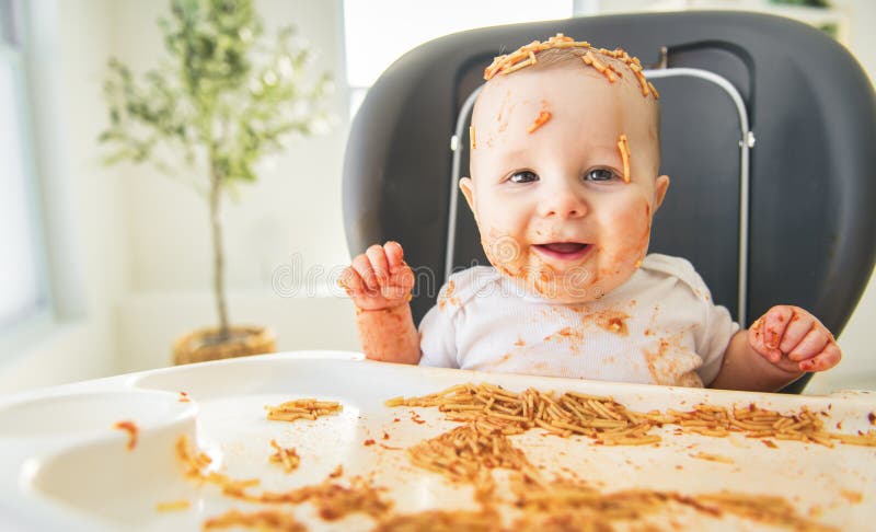 Little Baby Eating Her Dinner and Making a Mess Stock Image - Image of ...
