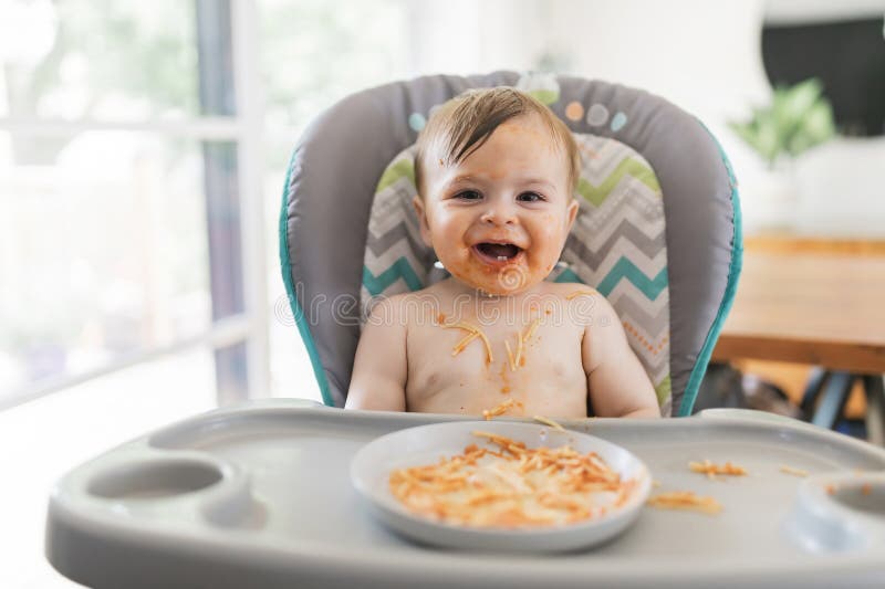 Little Baby Eating Her Dinner and Making a Mess Stock Photo - Image of ...