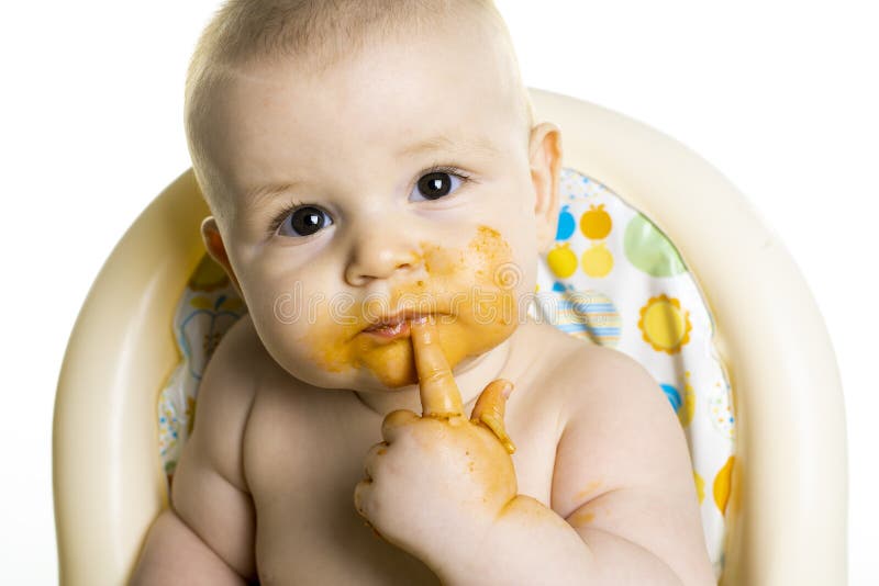Little Baby Eating Her Dinner Spaghetti and Making a Mess on His Face ...