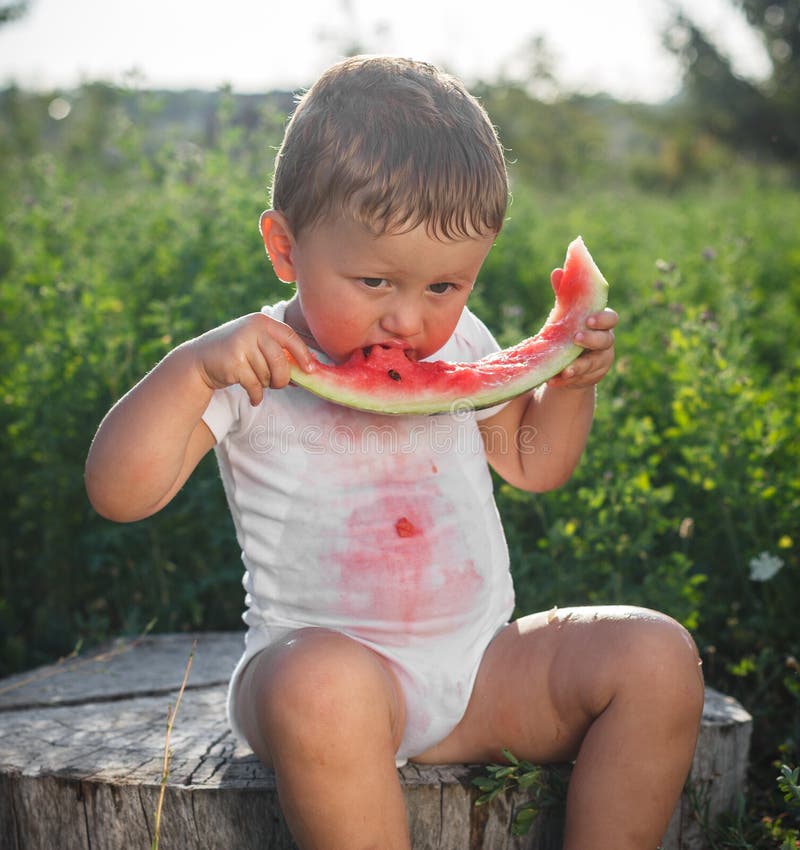 Little Baby Eating Watermelon Outdoors Stock Photo - Image of park ...