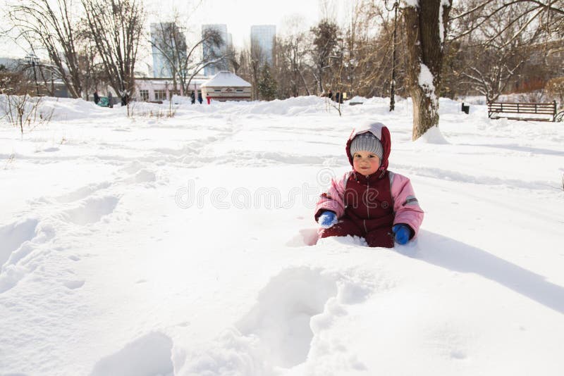 Little Baby Fell into the Snow and Sits Stock Image - Image of season ...