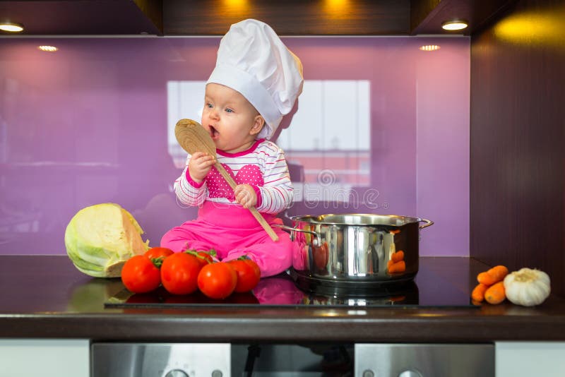 Little baby girl cook stock photo. Image of cute, childhood - 65072464