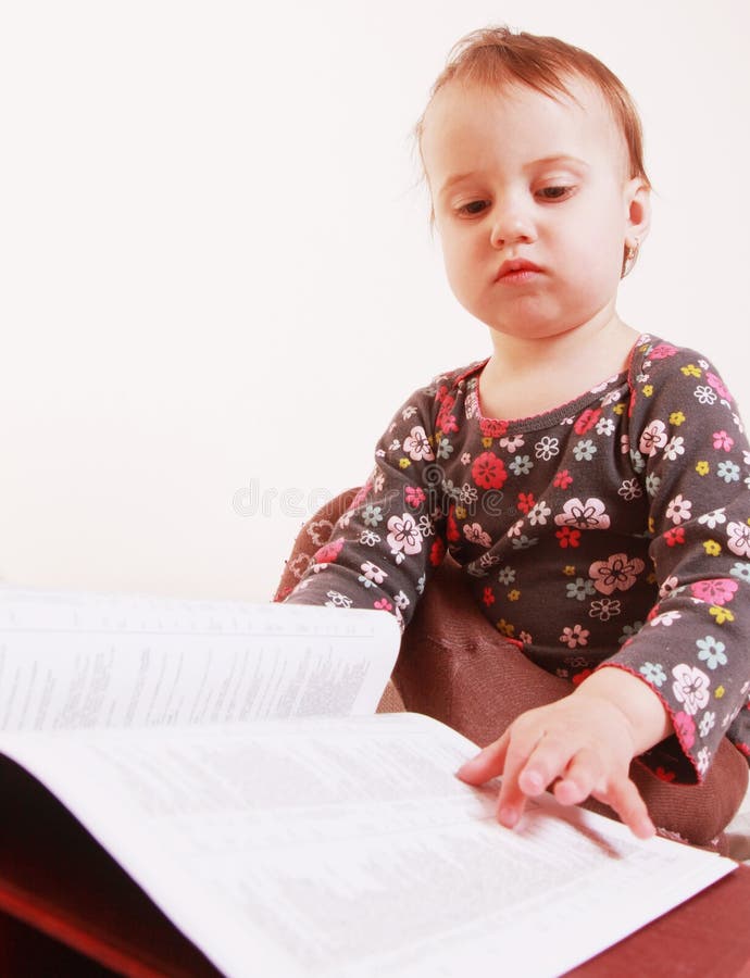 Little Baby Girl Reading a Book (development, Education) Stock Photo ...