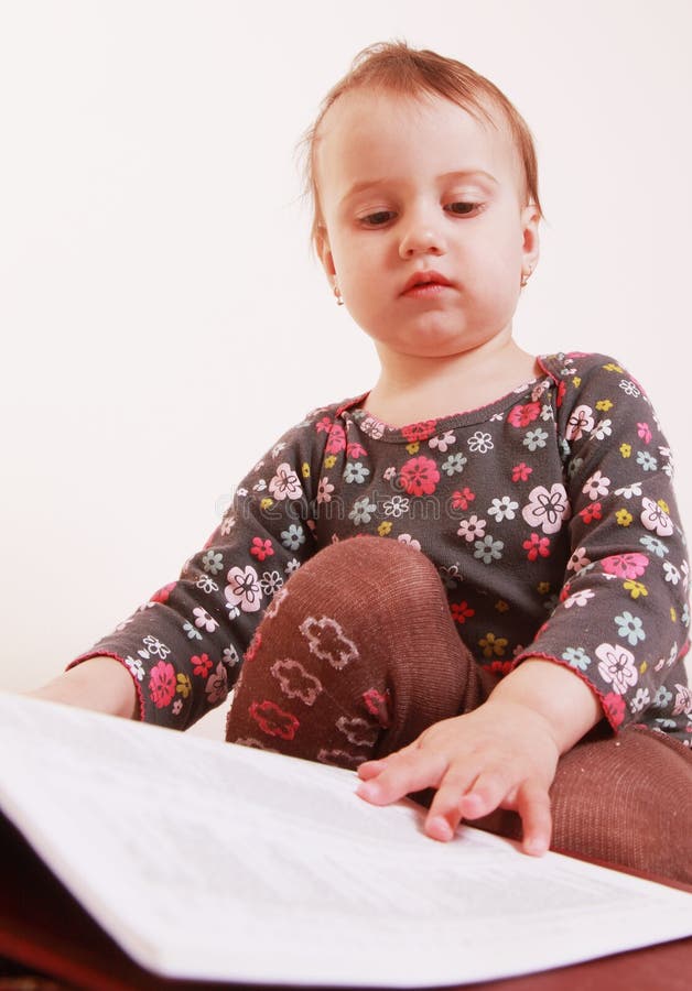 Little Baby Girl Reading a Book (development, Education) Stock Photo ...