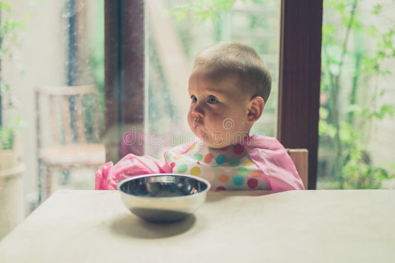 Little Baby Learning How To Eat at Table Stock Image - Image of door ...