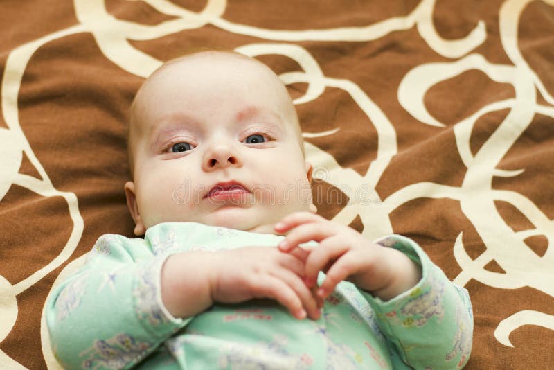 Pensive Kid Lying on the Bed Stock Image - Image of adorable, blue ...